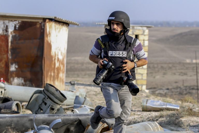 Risking it All: The Life of a Military Journalist - Photojournalists on war